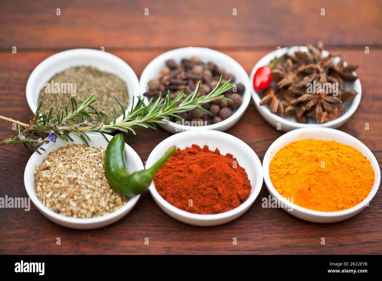 Bowls of herbs and spice. an assortment of colorful spices Stock Photo ...