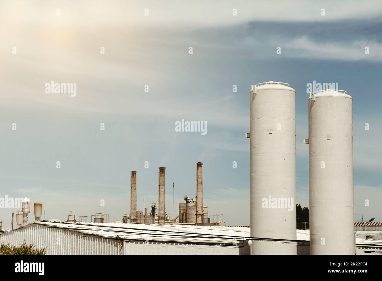 smoke towers in industrial area Stock Photo - Alamy