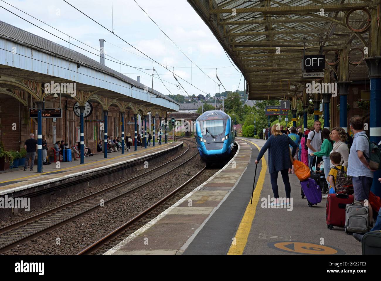 Passengers waiting as a Trans Pennine Express Class 397 Nova 2 train ...