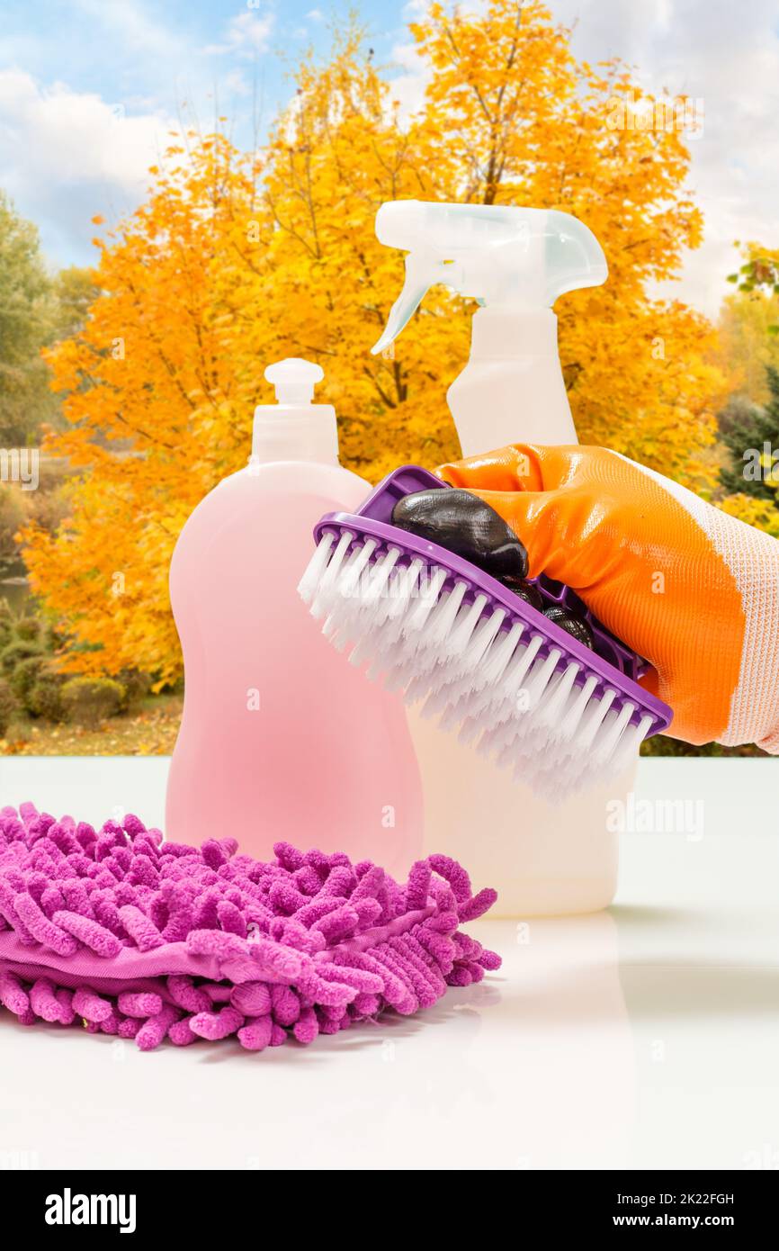 Close-up view of a man's hand in a rubber protective glove with a ...