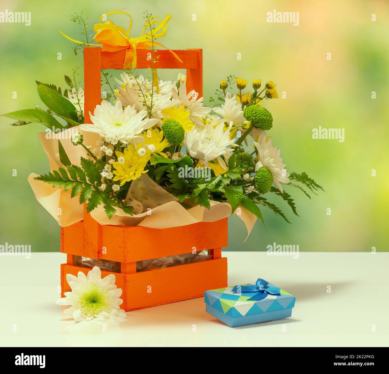 Beautiful bouquet of various flowers with gift boxes Stock Photo - Alamy