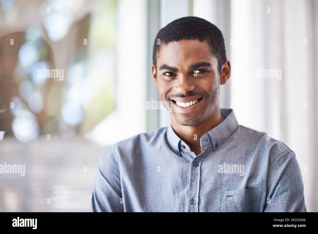 Confident about the future. Portrait of a handsome young man standing ...