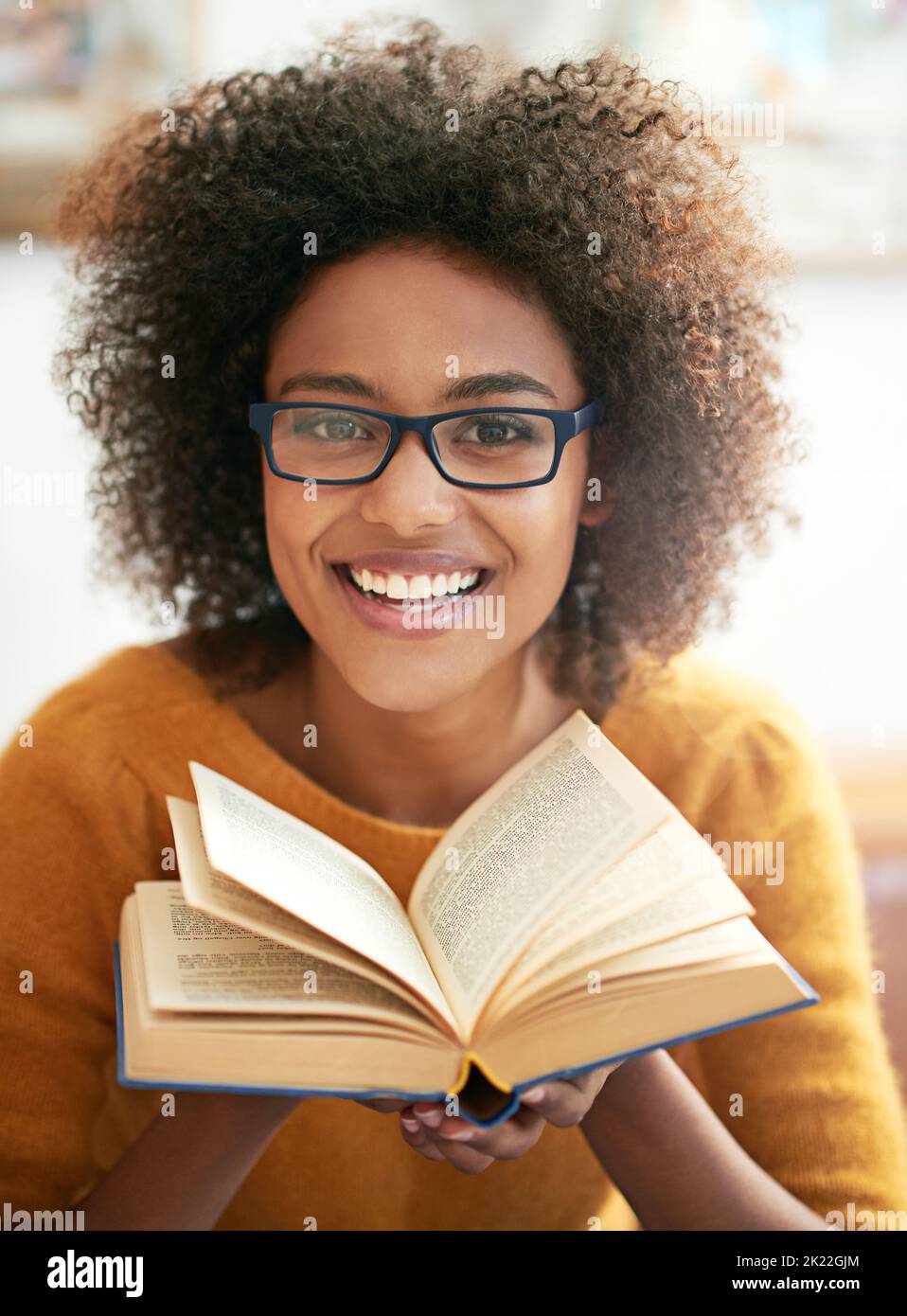 Whens the last time YOU opened a book...Cropped portrait of a young ...