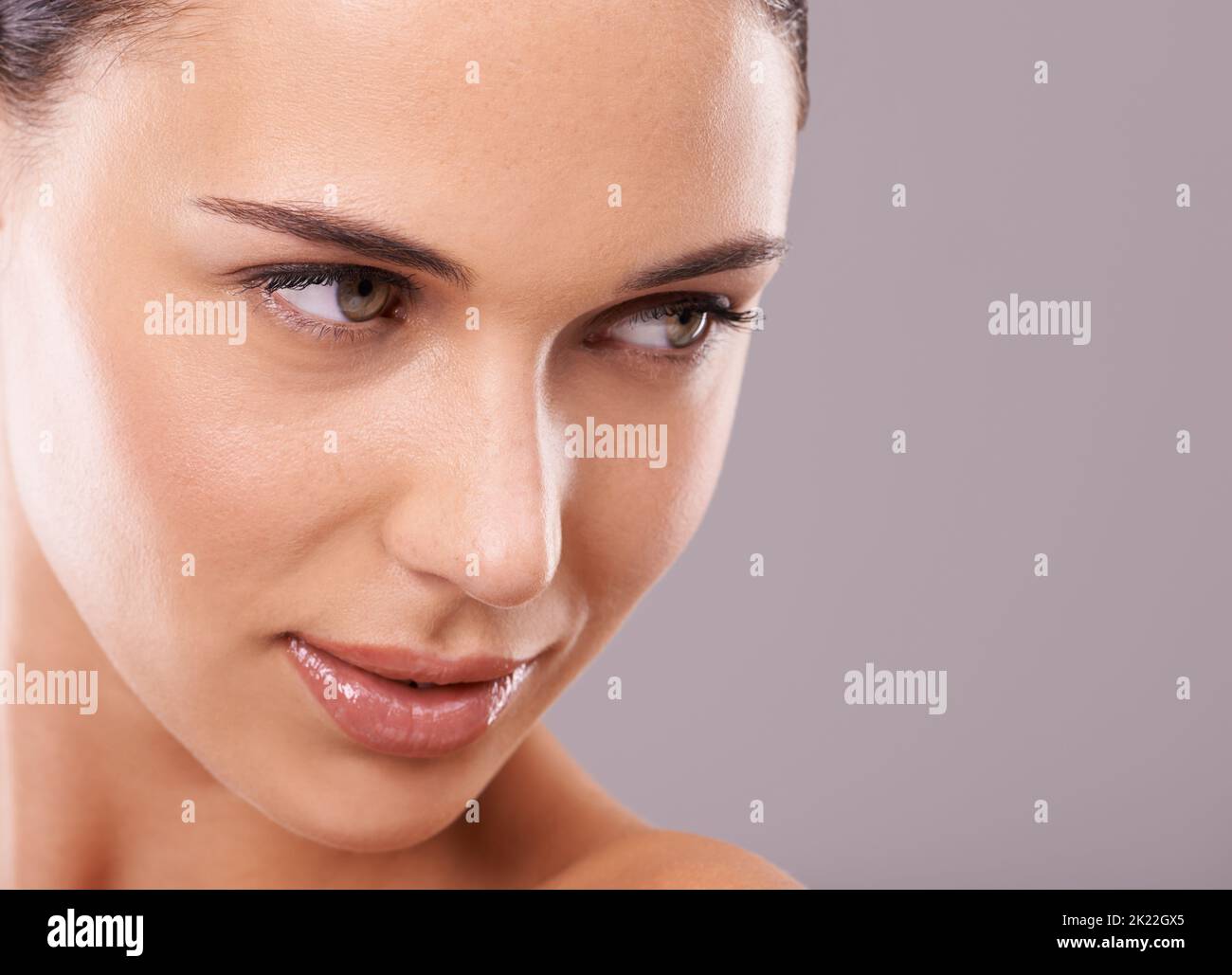 Seeing her beauty close up. Beauty shot of a beautiful young woman with ...