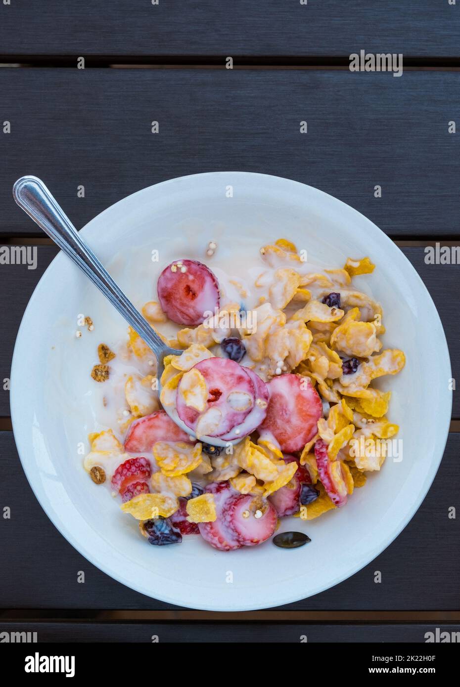 Yogurt bowl with fresh strawberries and dry corn flakes.Breakfast ...