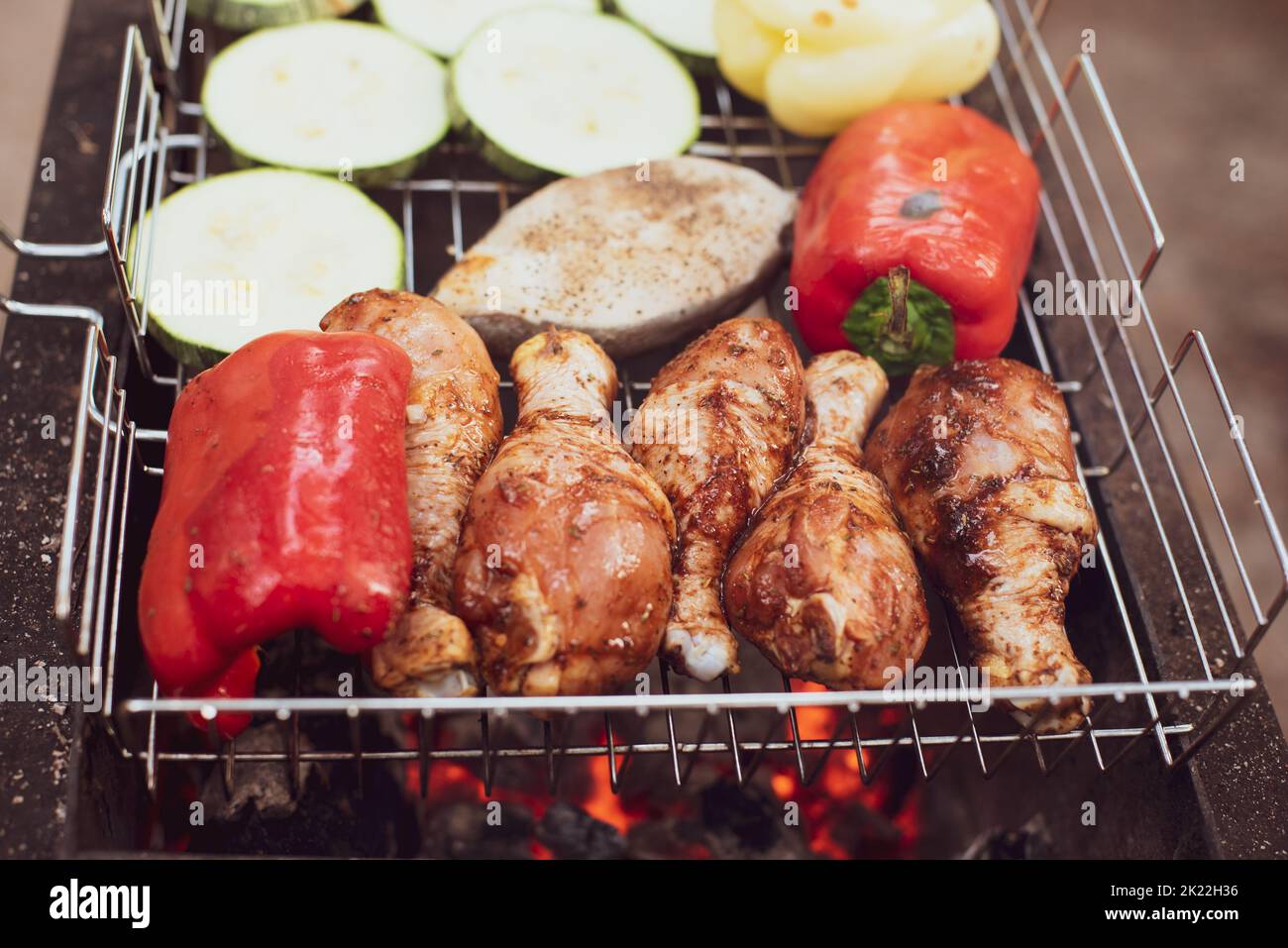 The process of cooking on a barbecue grill. Picnic food, outdoor food ...