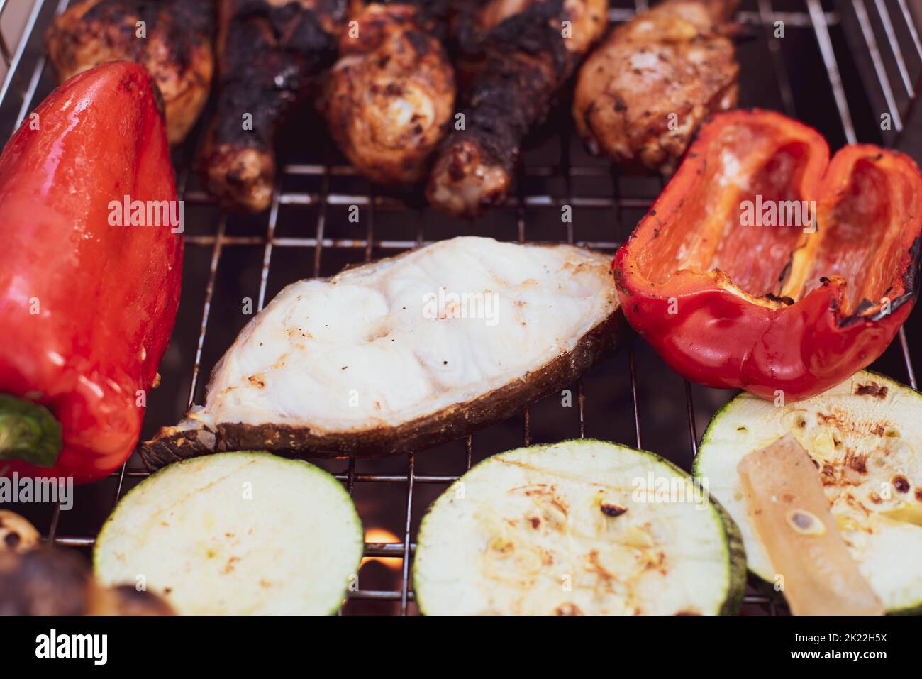 The process of cooking on a barbecue grill. Picnic food, outdoor food ...
