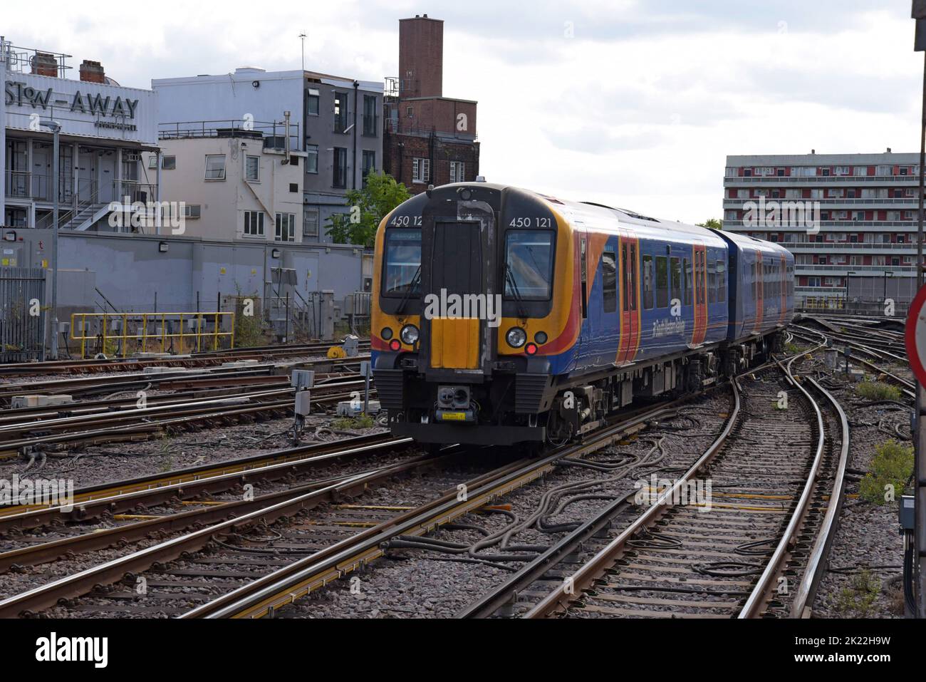 South Western Railway Siemens Desiro class 450 electric trains leaving ...