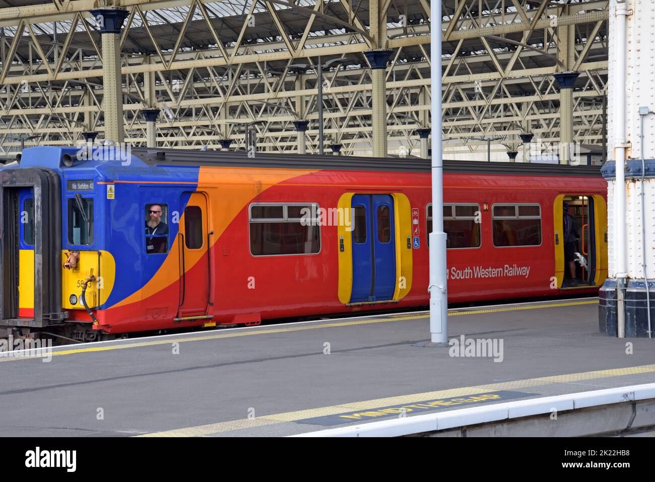 Train driver waiting for departure signal in a Class 455 South Western ...