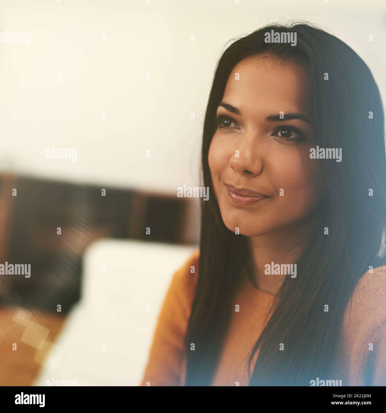 Floating away on a beautiful daydream. a young woman relaxing on her ...