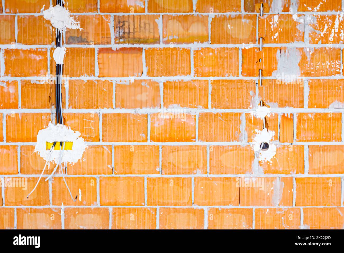 Exposed electrical sockets with the top covers removed for installation ...