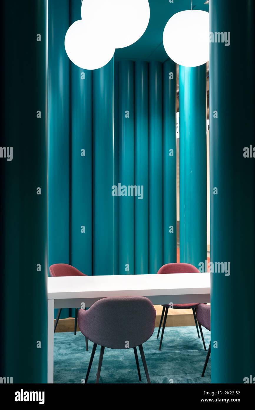 Interior decor: White Table, Chairs, Circular Ceiling Lamps and Tall ...