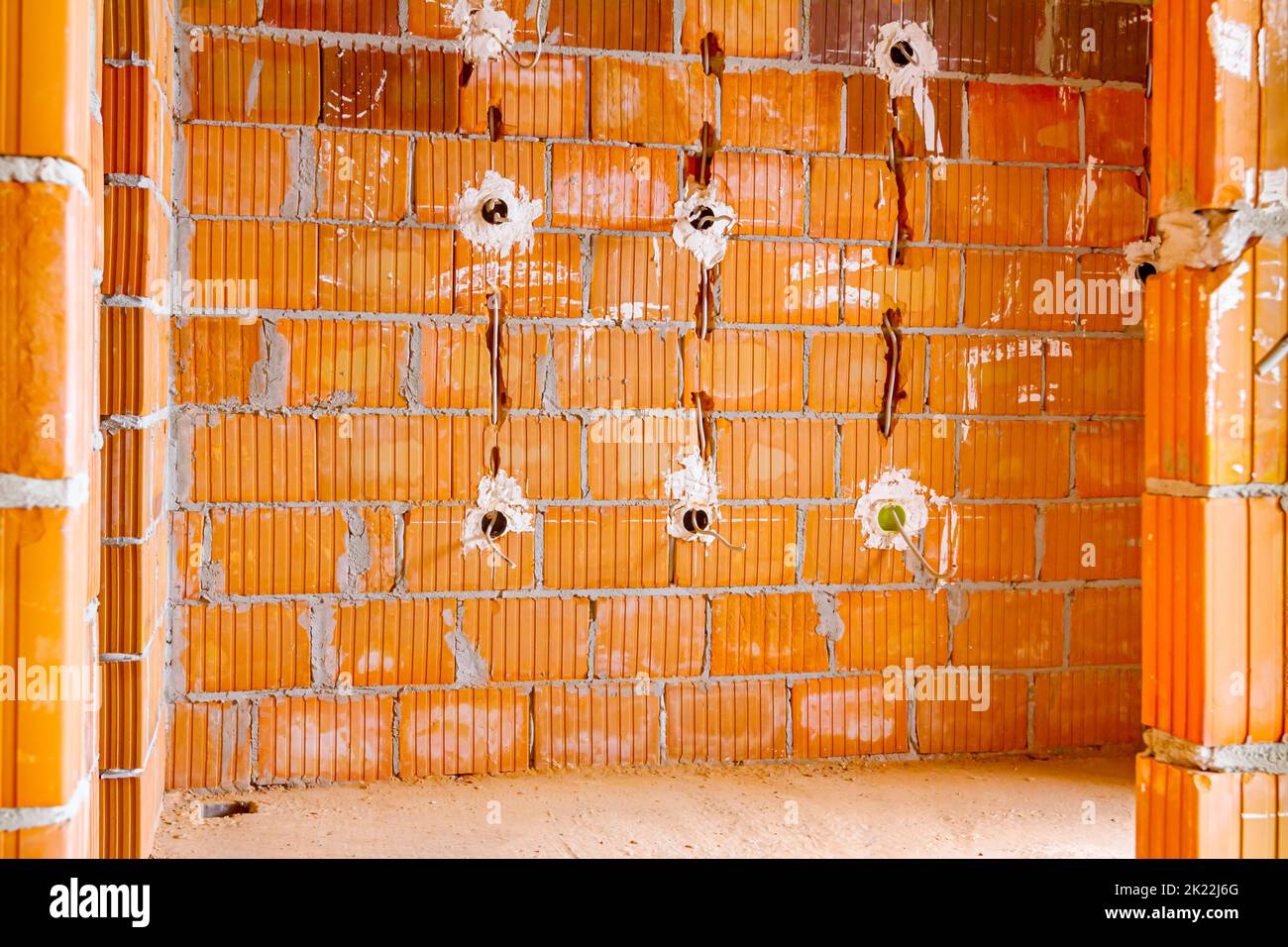 Exposed electrical sockets with the top covers removed for installation ...