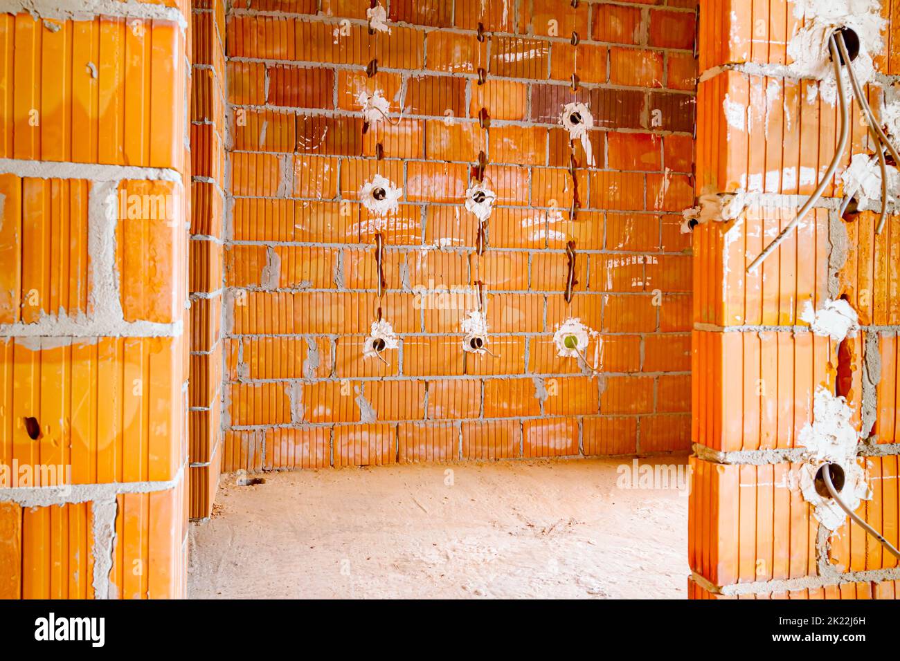 Exposed electrical sockets with the top covers removed for installation ...