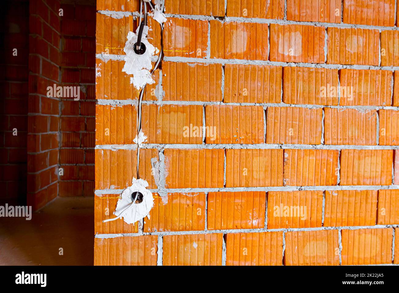 Exposed electrical sockets with the top covers removed for installation ...