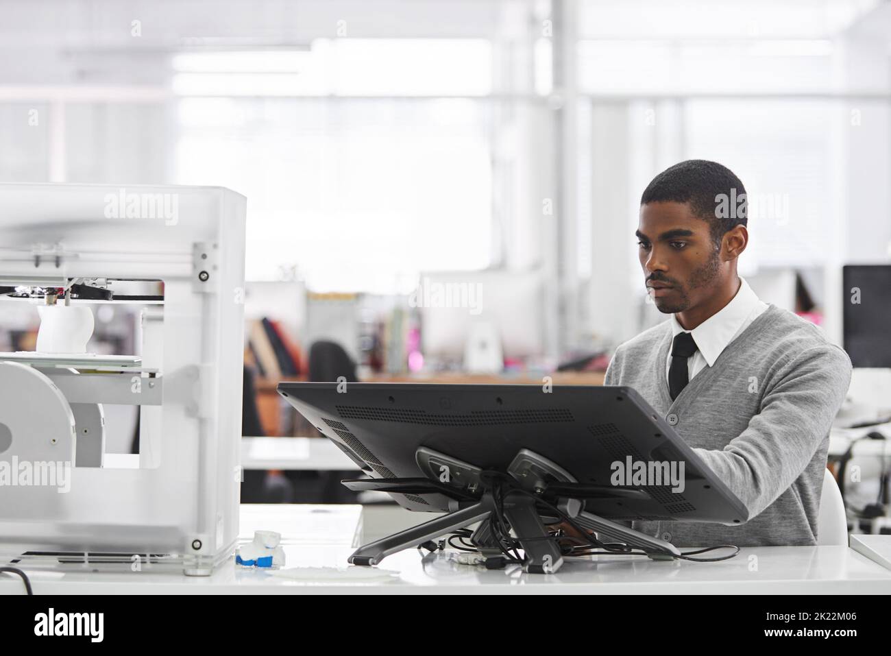 Dealing with the latest technology. a designer working on a touchscreen ...