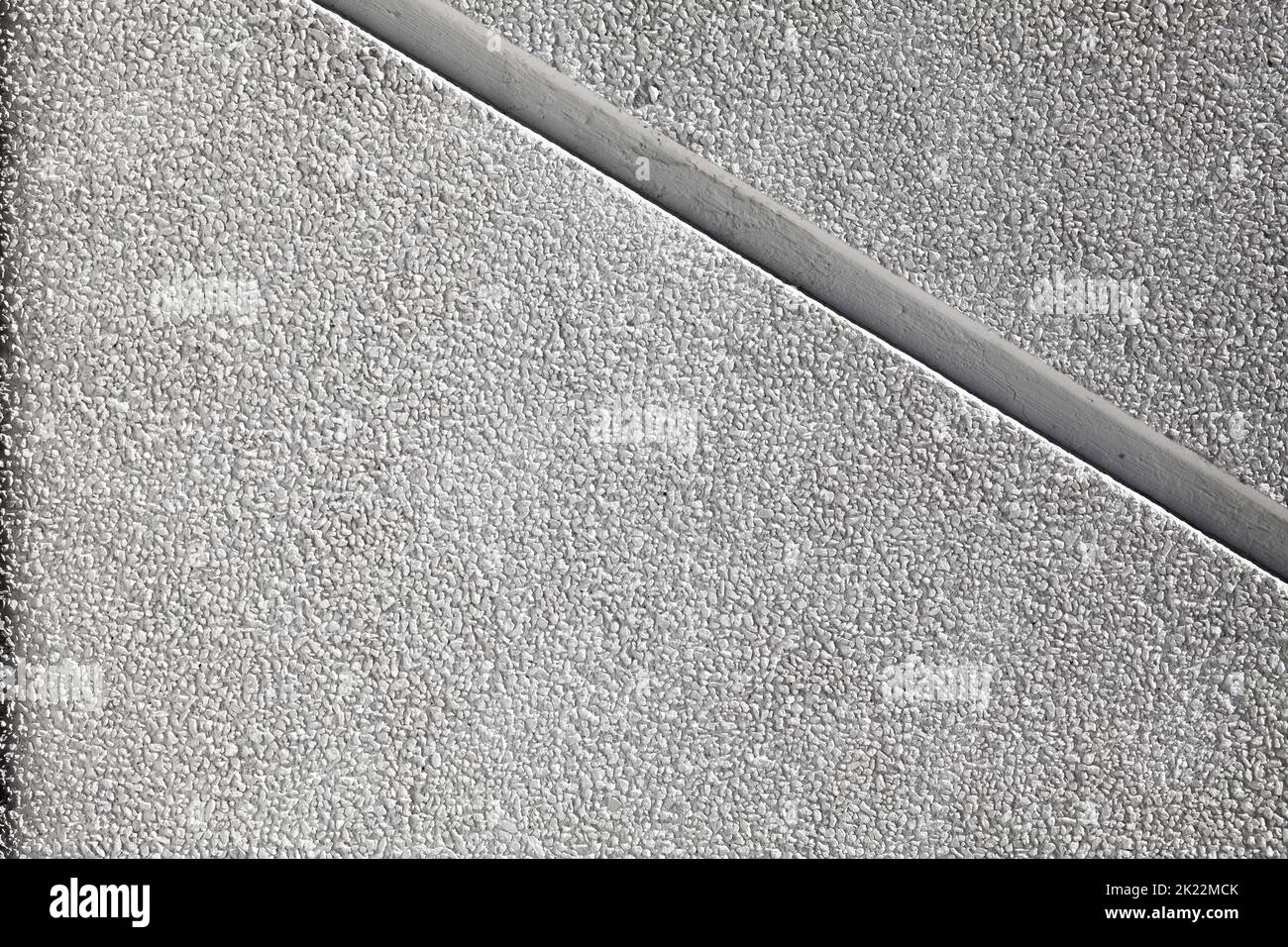 Relief line is on an empty white stone wall. Abstract background photo ...