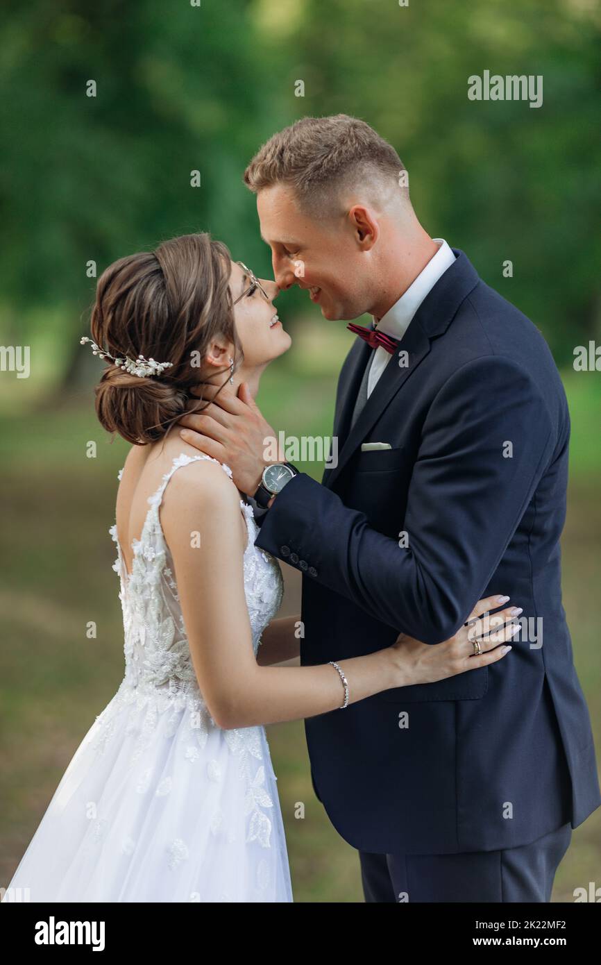 Bride and groom embracing hi-res stock photography and images - Alamy