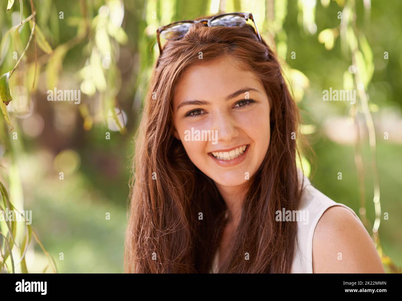 Just be natural. Portrait of an attractive teenage girl standing by a ...