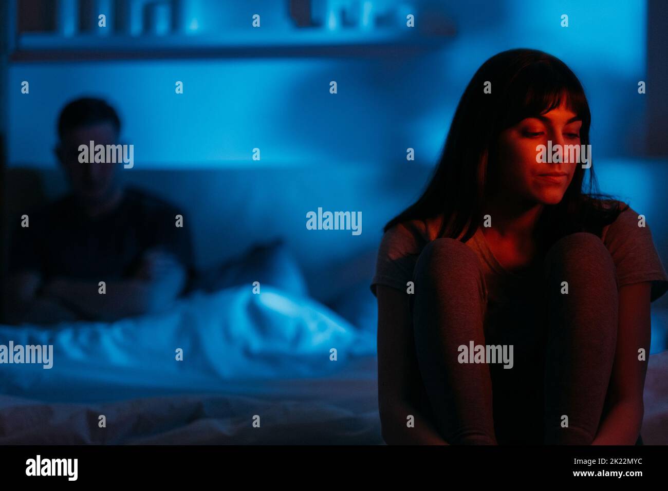 Couple quarrel. Night conflict. Marriage crisis. Disappointed upset ...