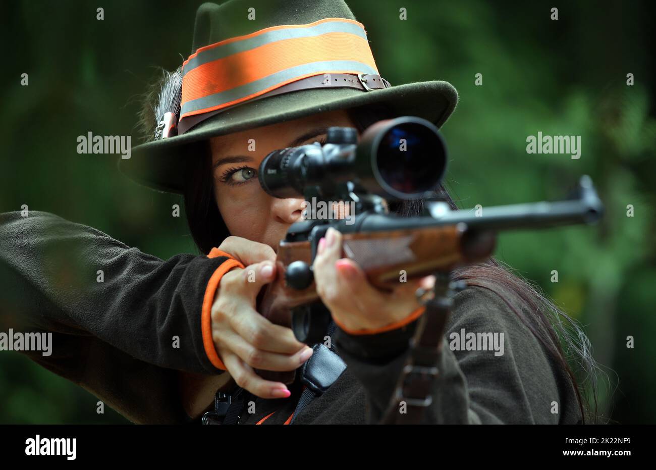 Spreenhagen, Germany. 16th Aug, 2022. A female hunter stands in a ...