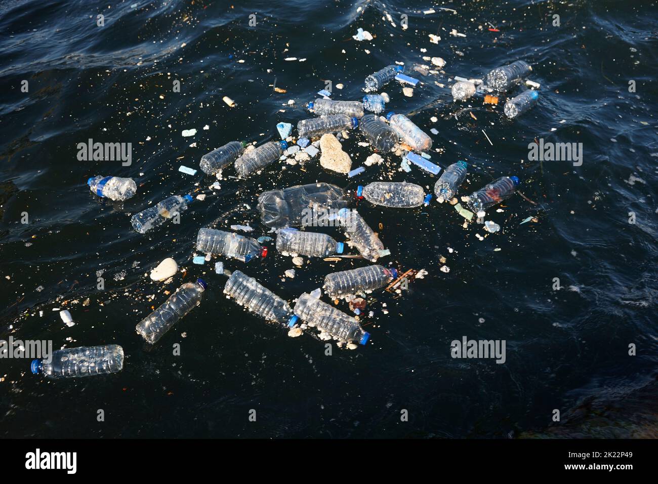 Plastic bottles in the sea. Garbage and pollution. Environmental issues ...