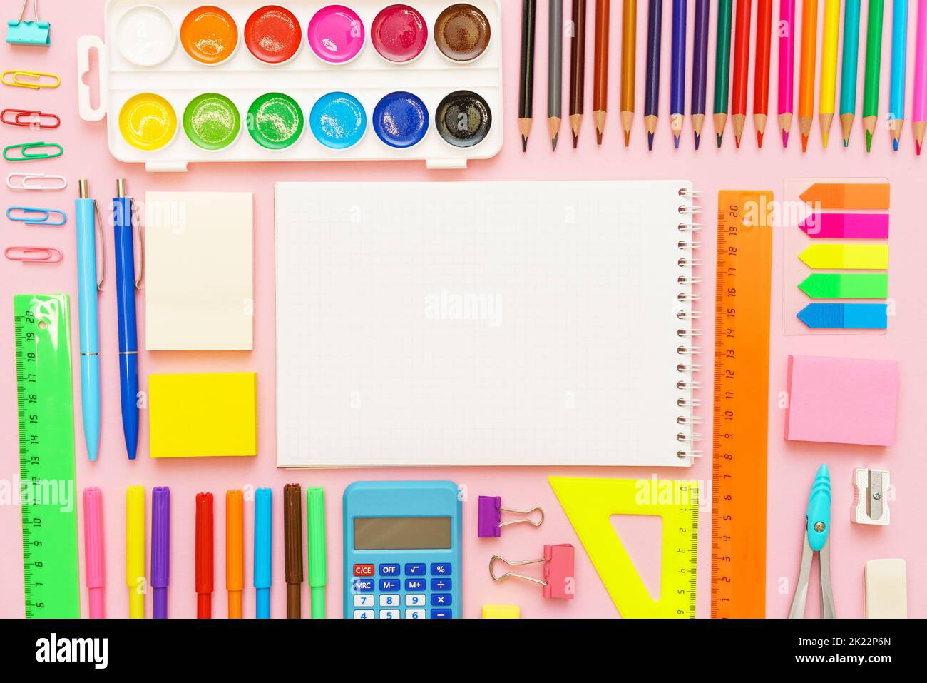 School note and landing on pink background. Back to school, home study ...