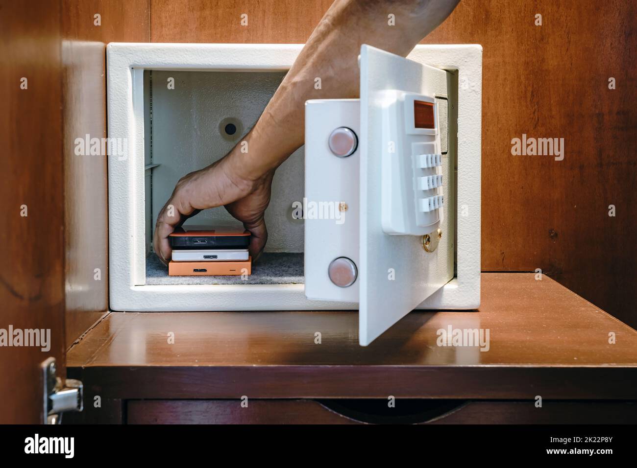 Security external hard drive in open metal safe. External hard disk ...