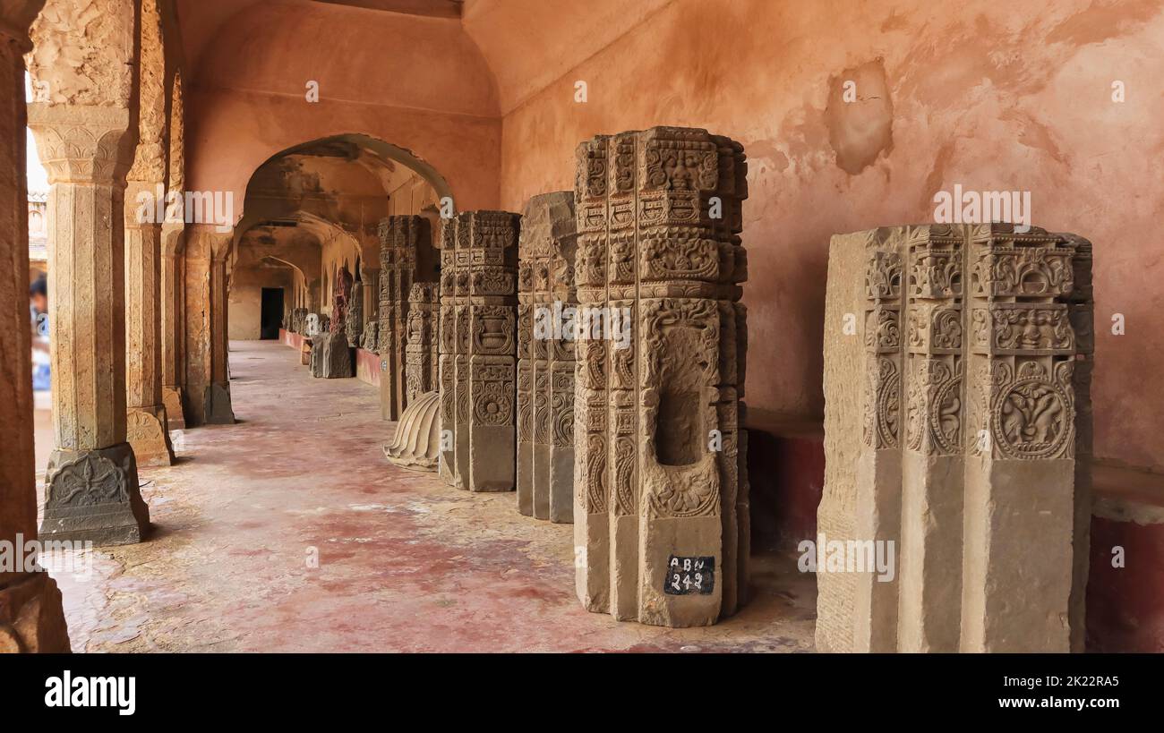 Broken carved pillars at the arcade of Chand Baori Stepwell, Abhaneri ...