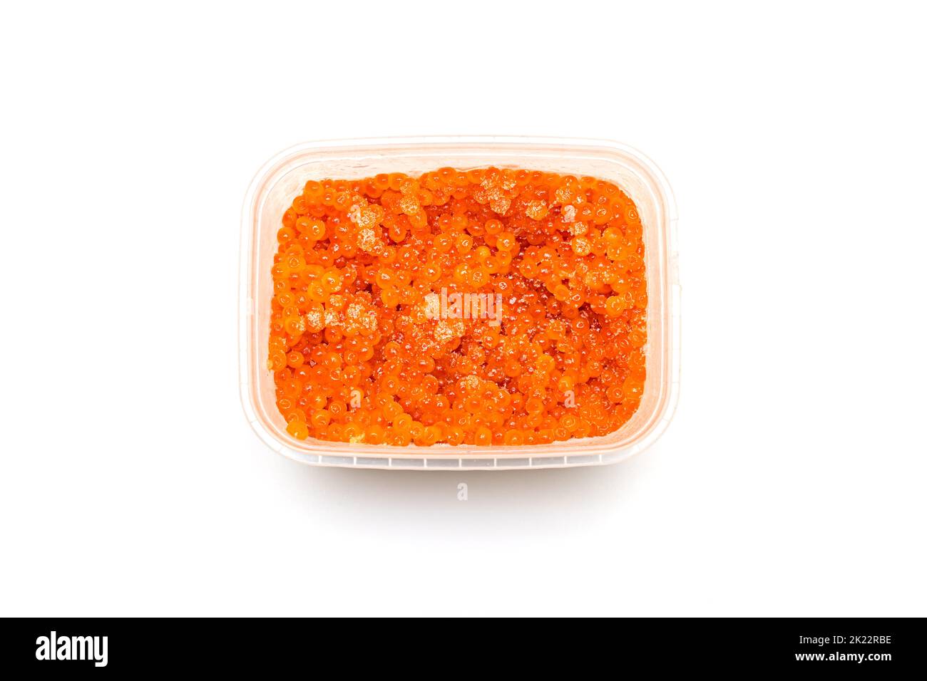 red caviar in a plastic container on a white background. red caviar in ...