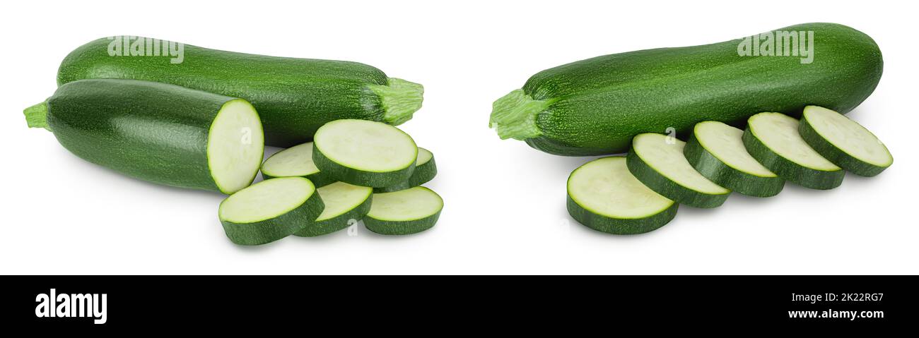 Fresh whole and sliced zucchini isolated on white background with full ...