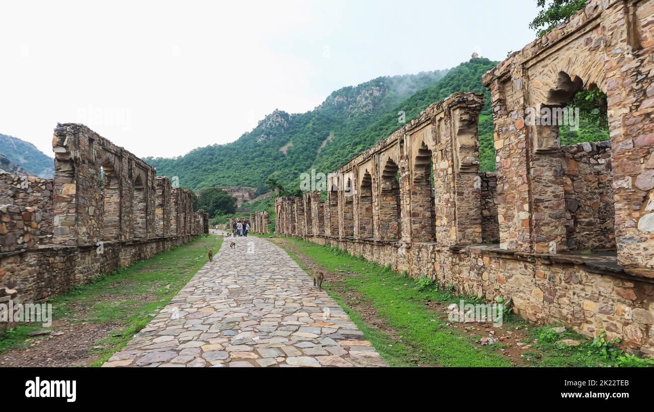INDIA, RAJASTHAN, BHANGARH, July 2022, Tourist at Ancient market place ...