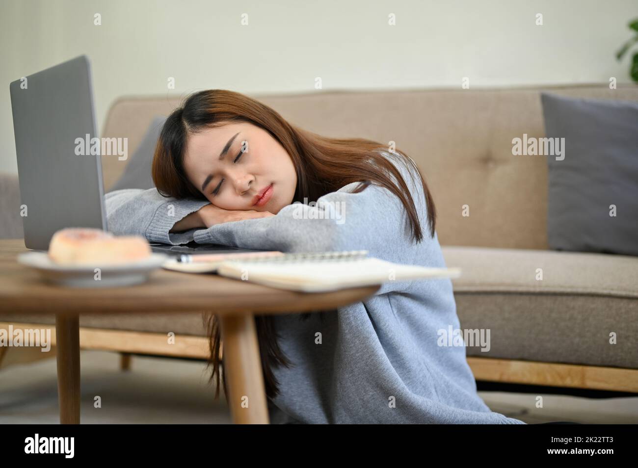 Girl asleep at a table hi-res stock photography and images - Alamy