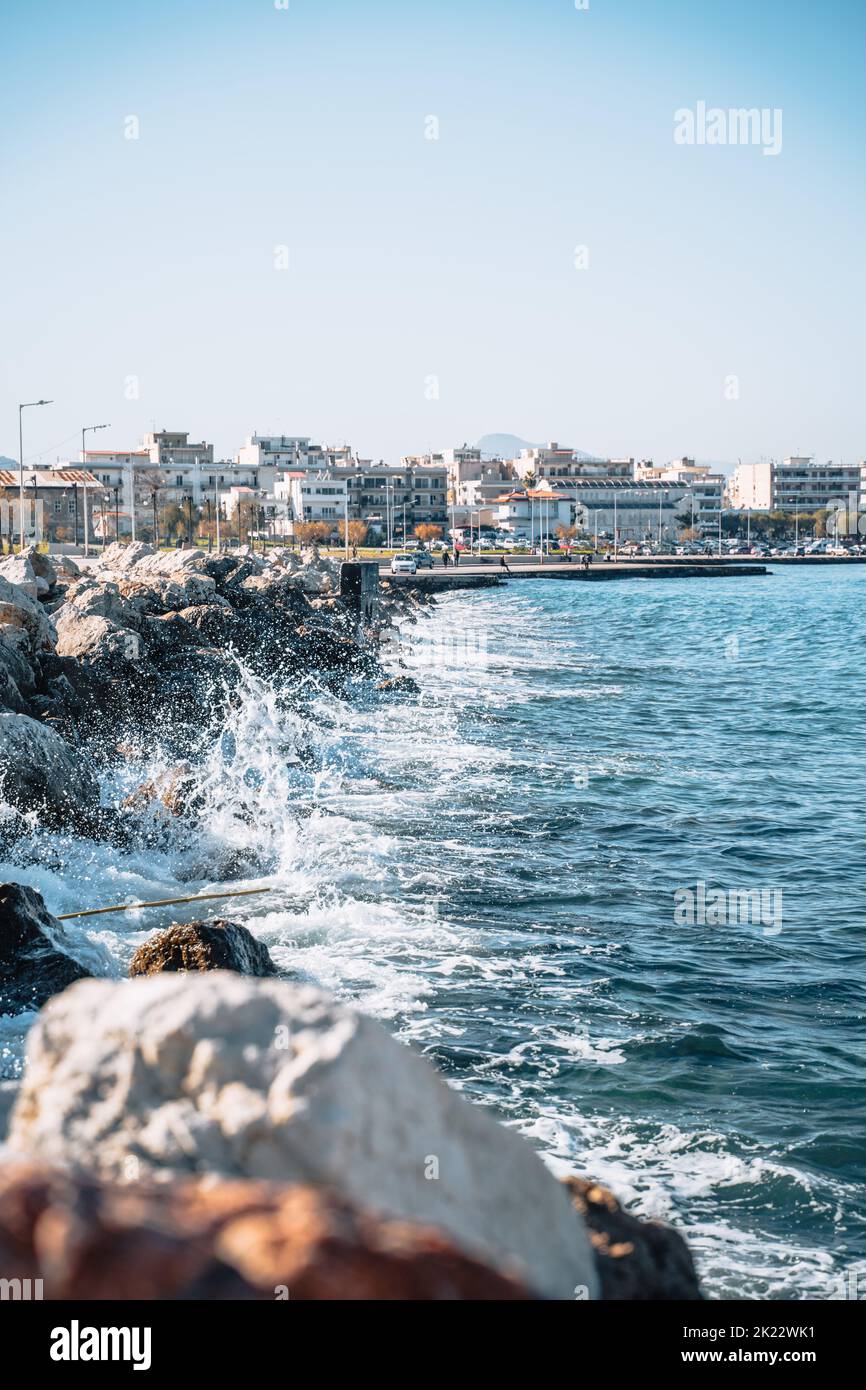 A vertical shot of the beautiful coast of Athens in Corinth Stock Photo ...