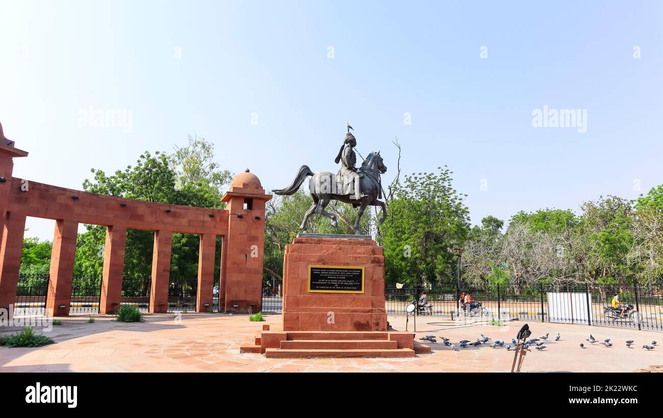 INDIA, RAJASTHAN, BIKANER, July 2022, Tourist at statue of Maharaja Sri ...