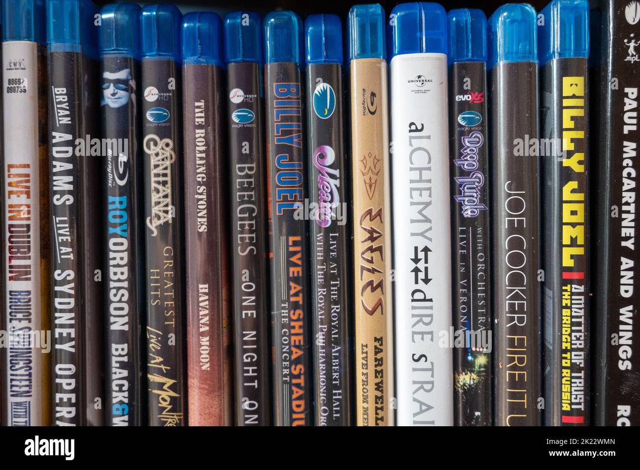 Row of music Blu-ray disc recordings edge on Stock Photo - Alamy
