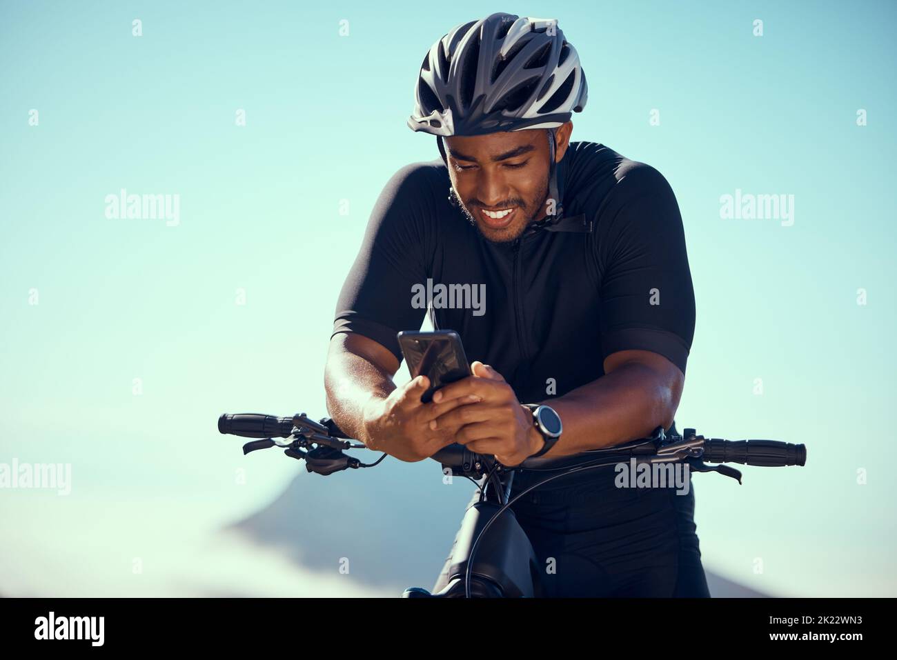 Bicycle, phone and fitness or gps app with smile happy about progress ...