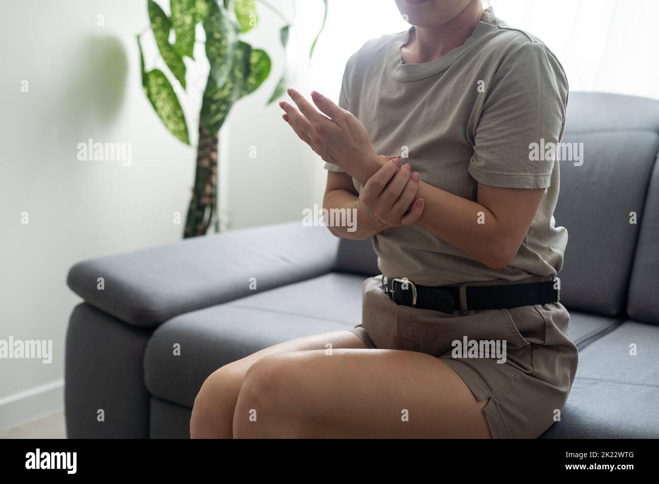 Young woman's arm. Arm pain and injury. Health care and medical concept ...