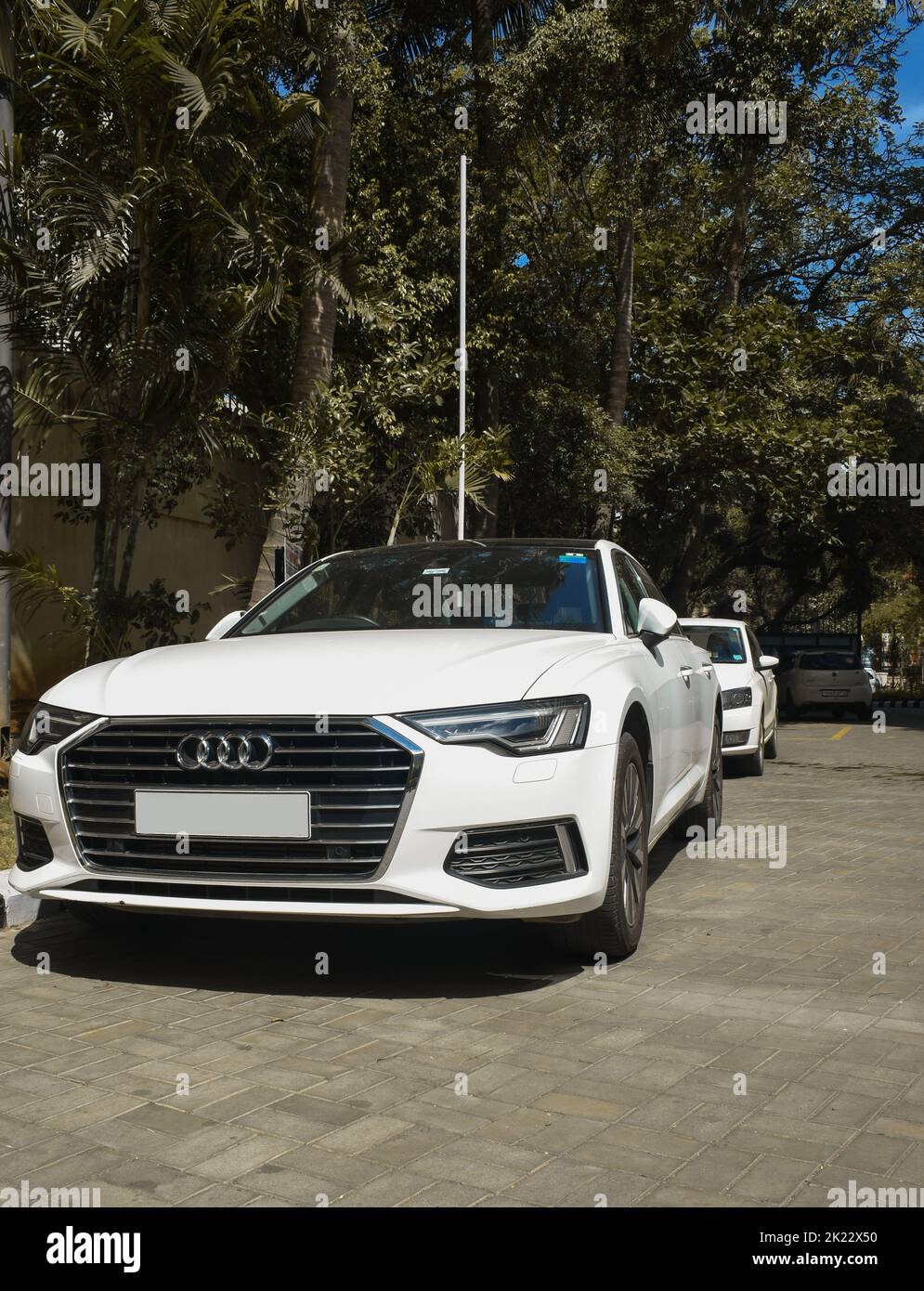 A vertical shot of the front of Audi A6 parked in the street Stock ...