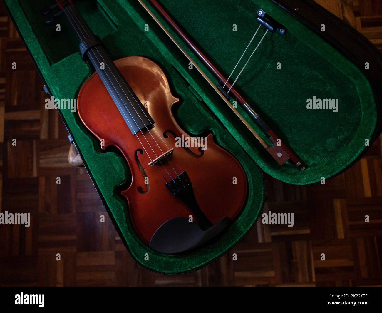 Red wooden violin in box Stock Photo - Alamy