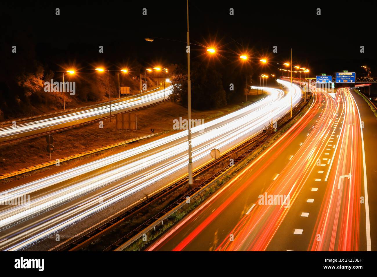 Car lights at a highway at night Stock Photo - Alamy