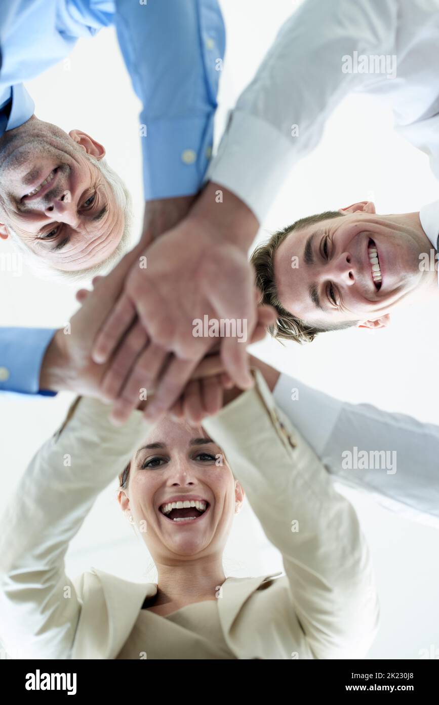 Group business people standing huddle hi-res stock photography and ...