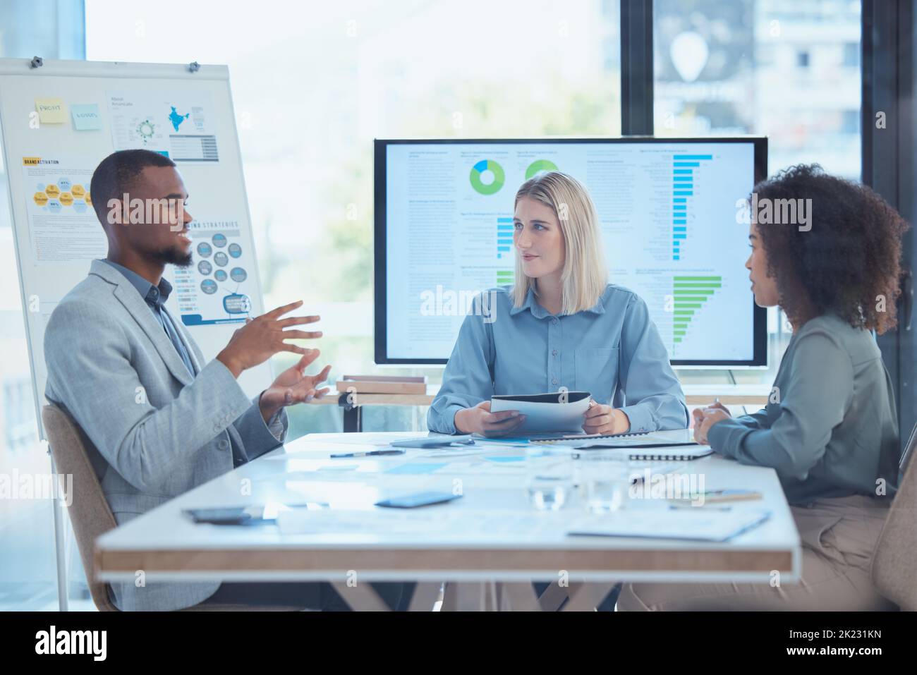 Business meeting talking about strategy, sales and developing of the ...