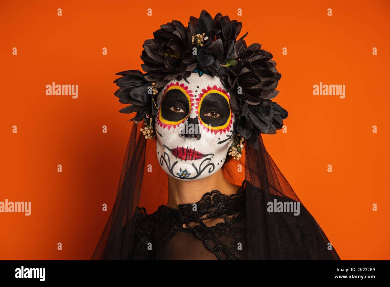 portrait of woman in black wreath and sugar skull halloween makeup ...