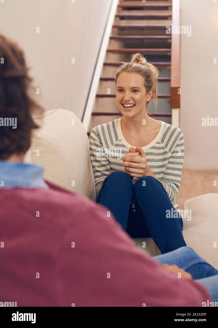 Two people talking sofa man woman hi-res stock photography and images ...