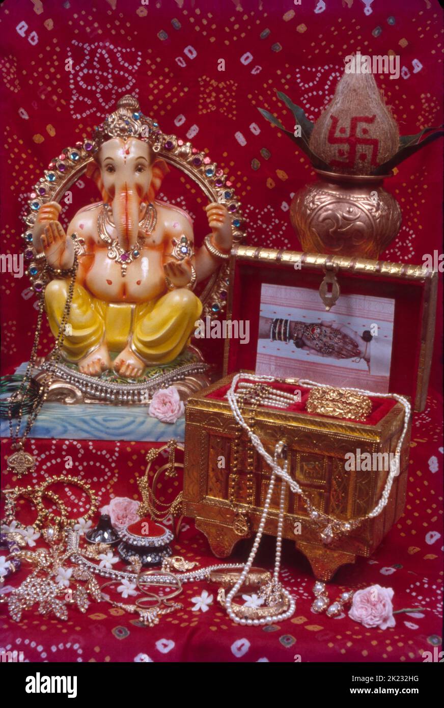 Brides Trousseau with Ganpati, Kalash & Jewelry Stock Photo - Alamy