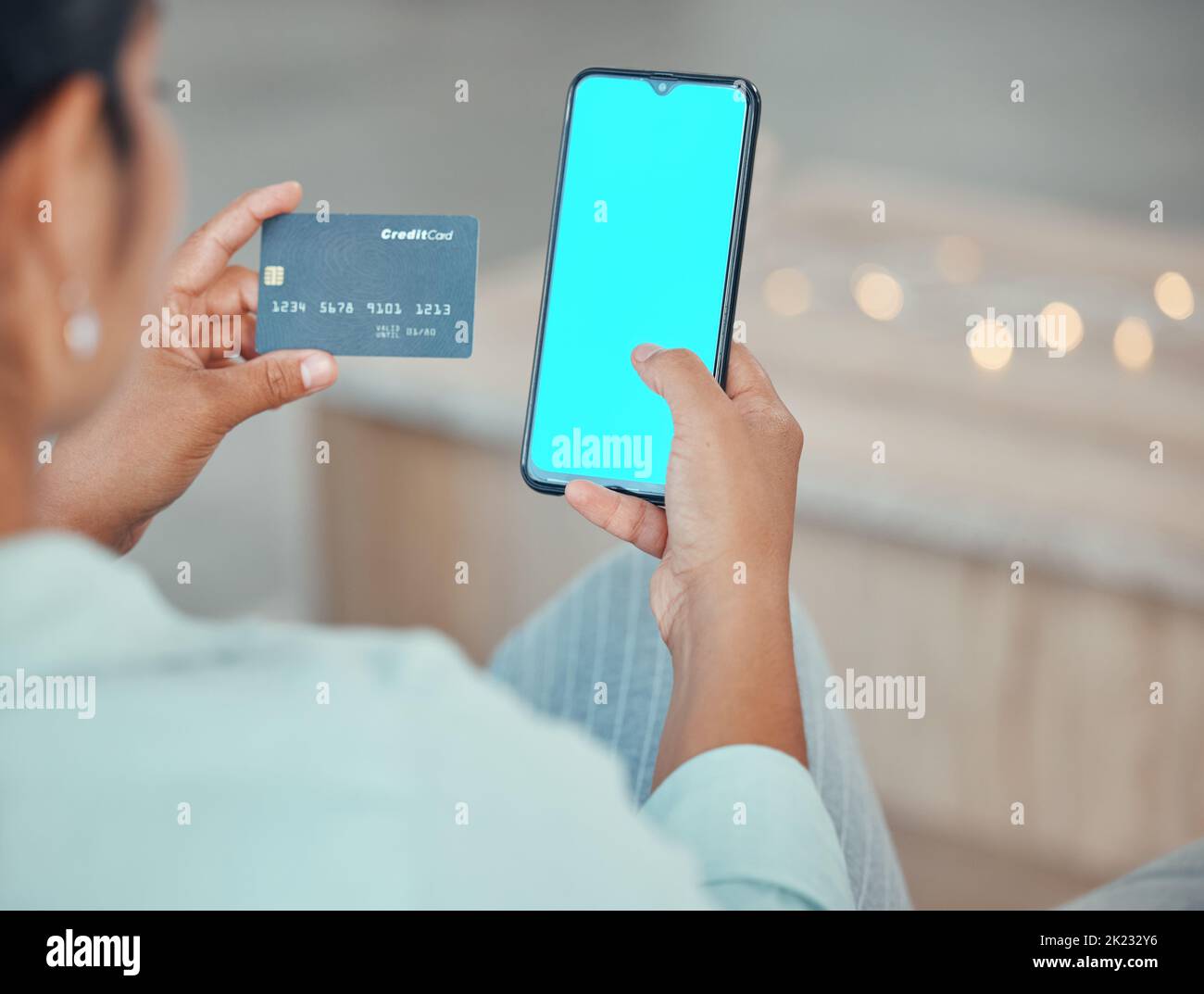 Ecommerce, credit card and woman with green screen phone mockup in hand for a payment, online ...