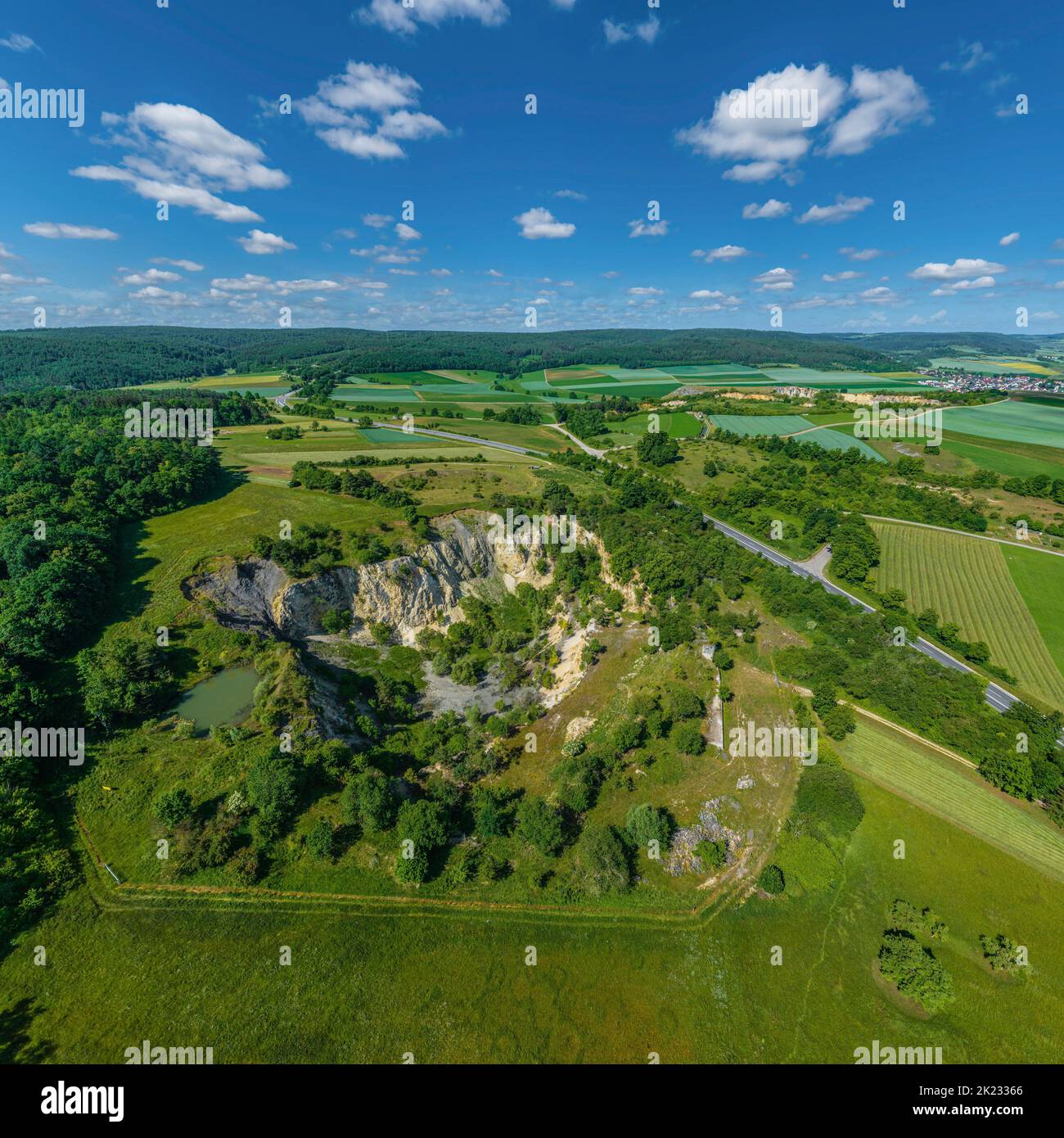 Aerial view to the geotope Lindle Quarry near Nördlingen in Bavaria ...