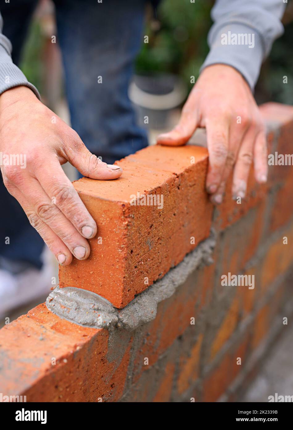 Everything is built one brick at a time. a master bricklayer at work ...