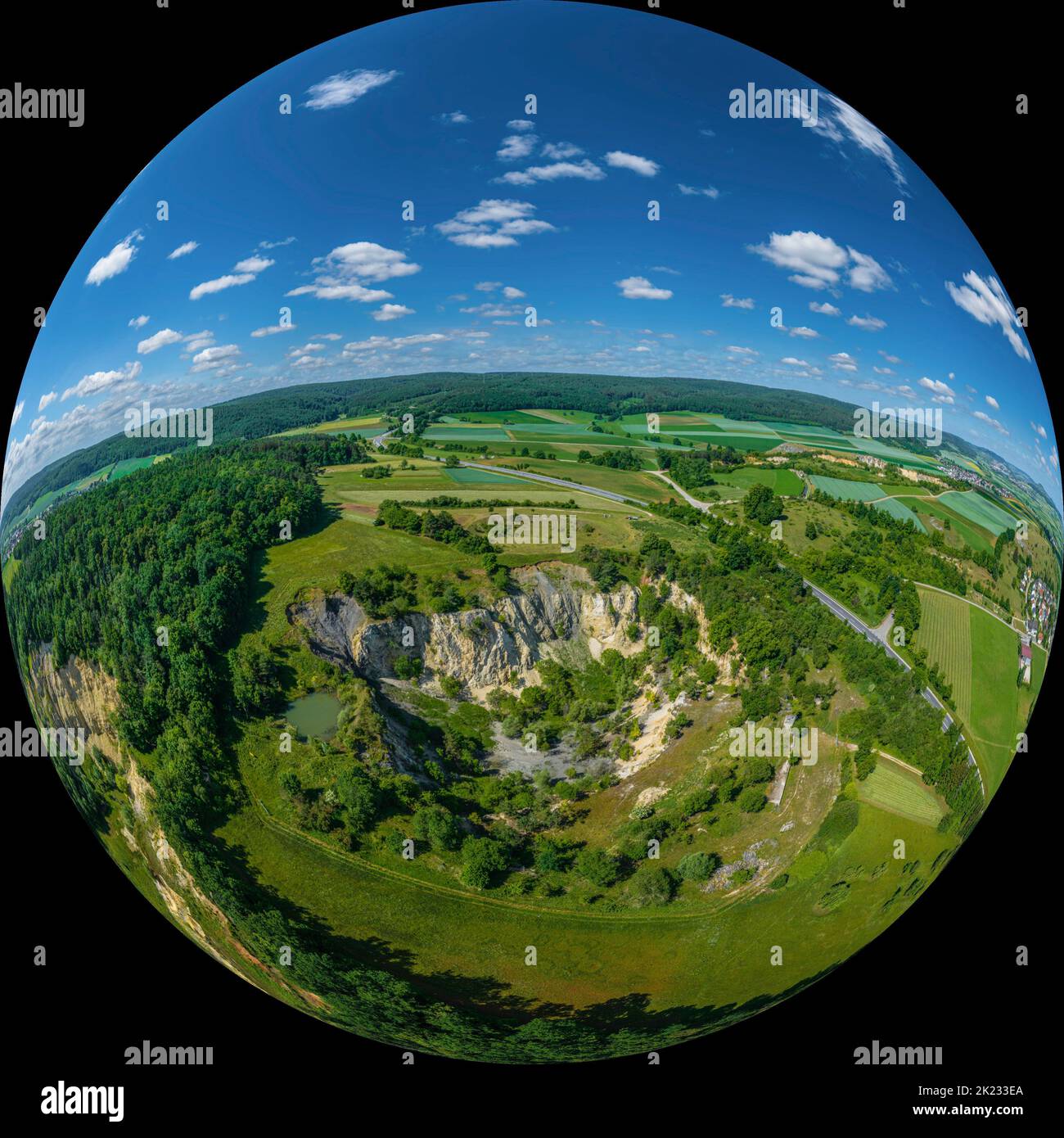 Aerial view to the geotope Lindle Quarry near Nördlingen in Bavaria ...